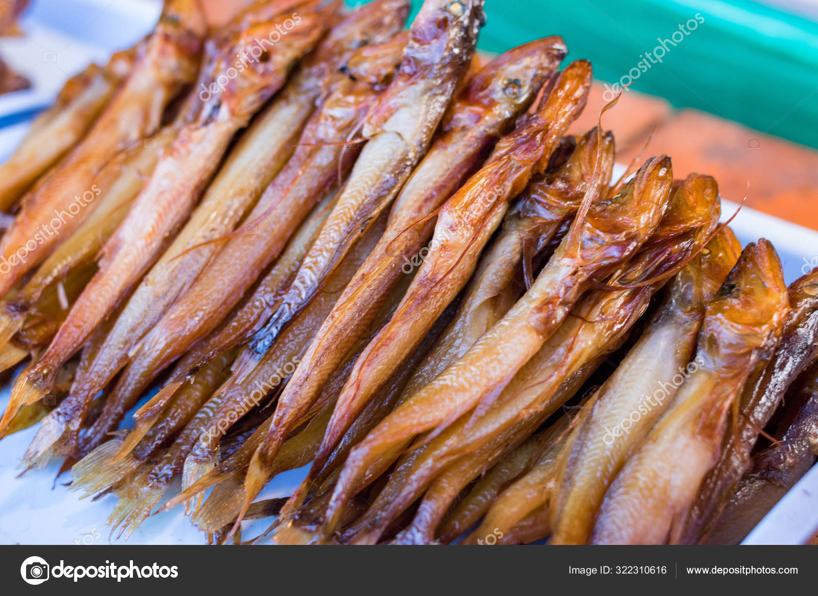 Baikal fish hot smoked and dried on the street market. Listvyanka ...