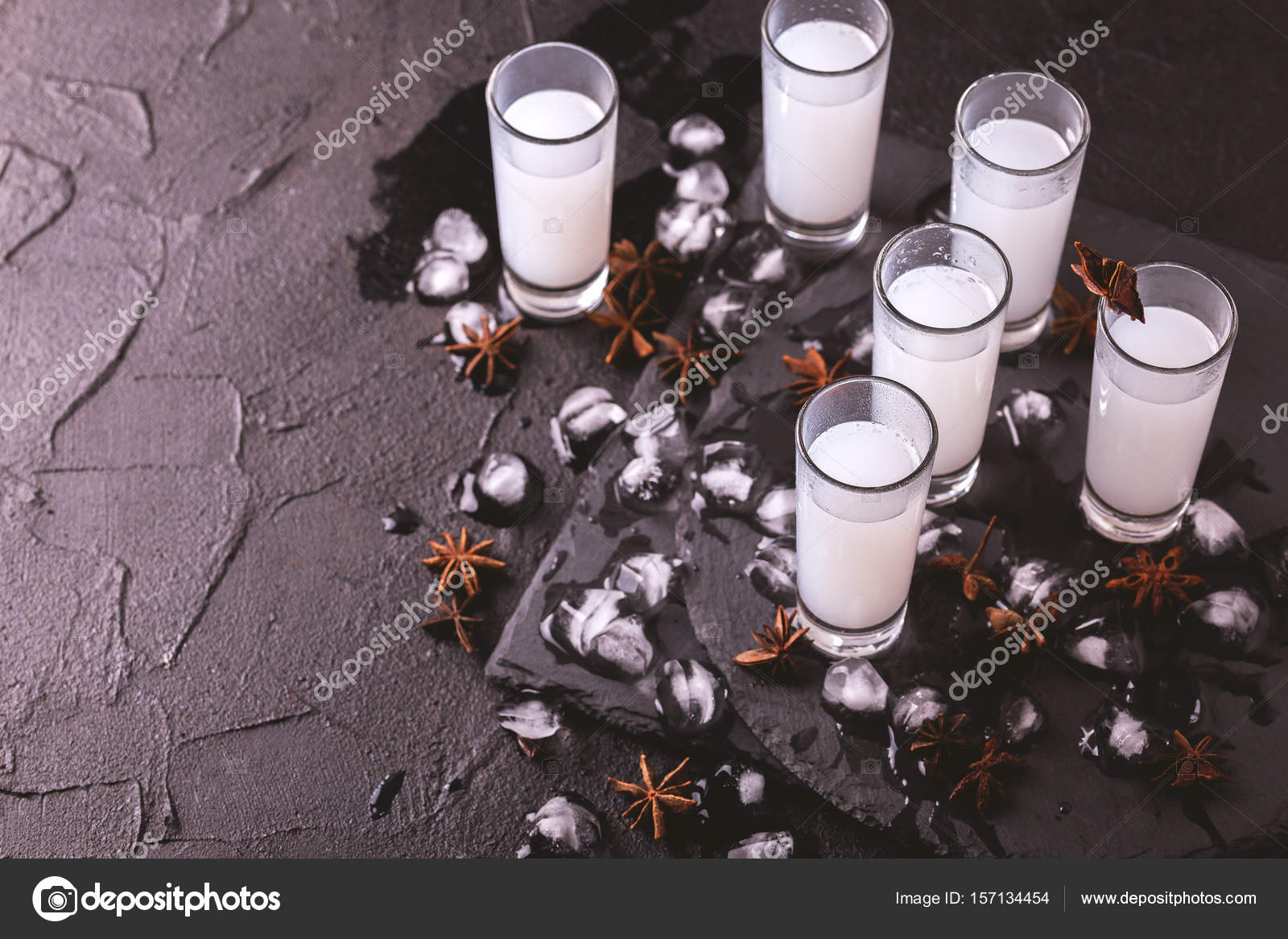 Arabic alcohol Raki with anis and ice. Arak, Ouzo Stock Photo by ©julie ...