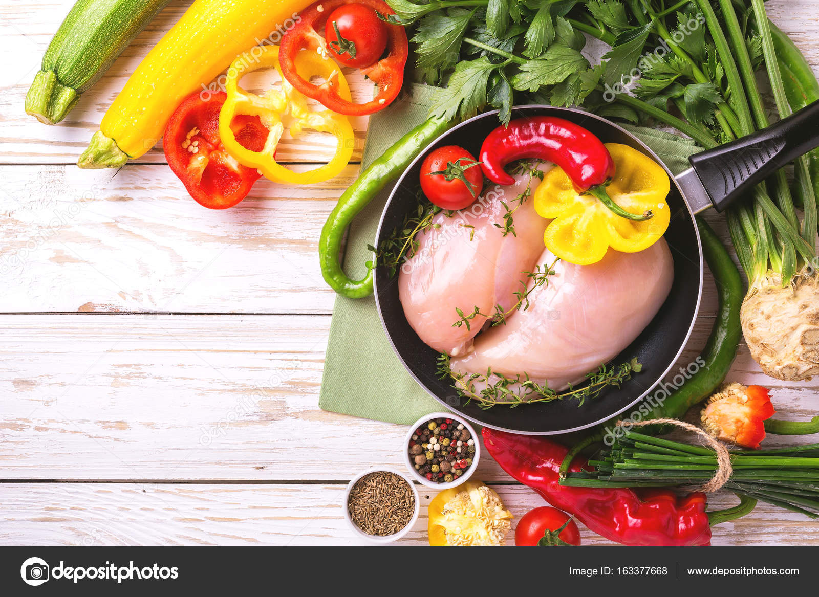 Raw chicken breast fillets with vegetables ingredients in pan — Stock ...
