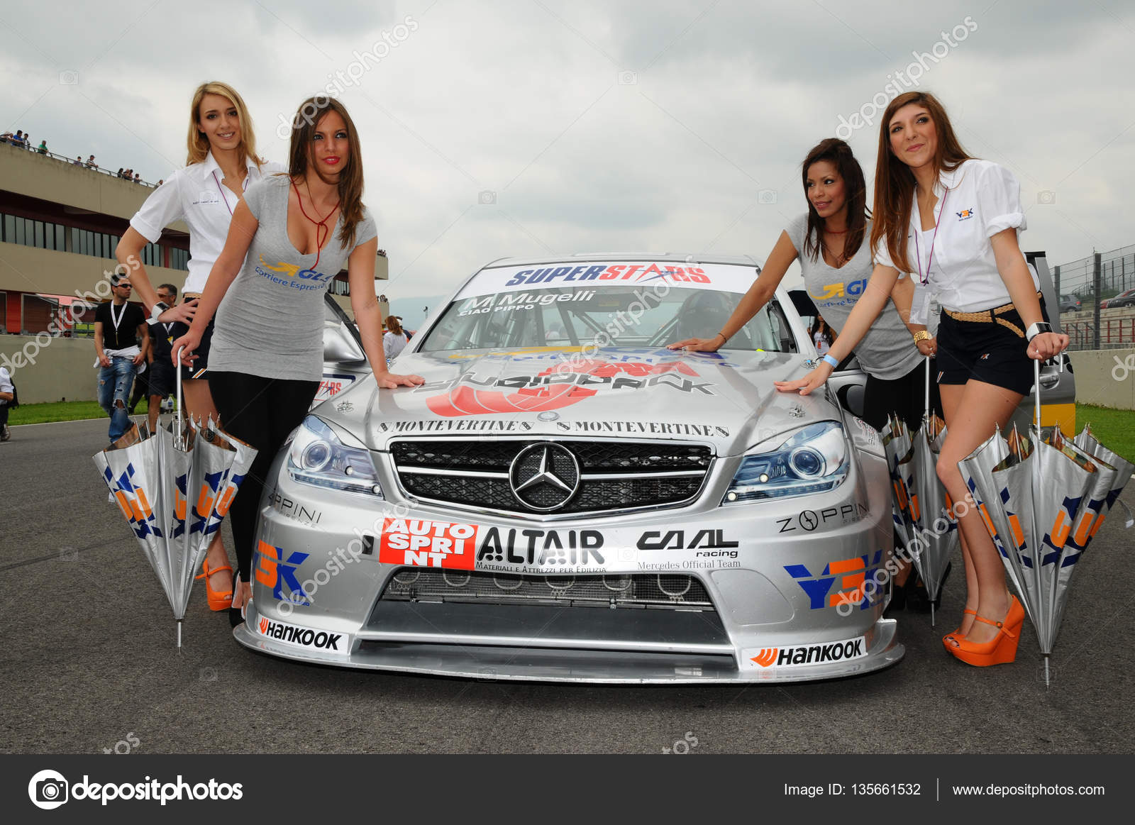 Beautiful Unidentified Pit Babes poses for photos in the paddock during Superstars Championship ...