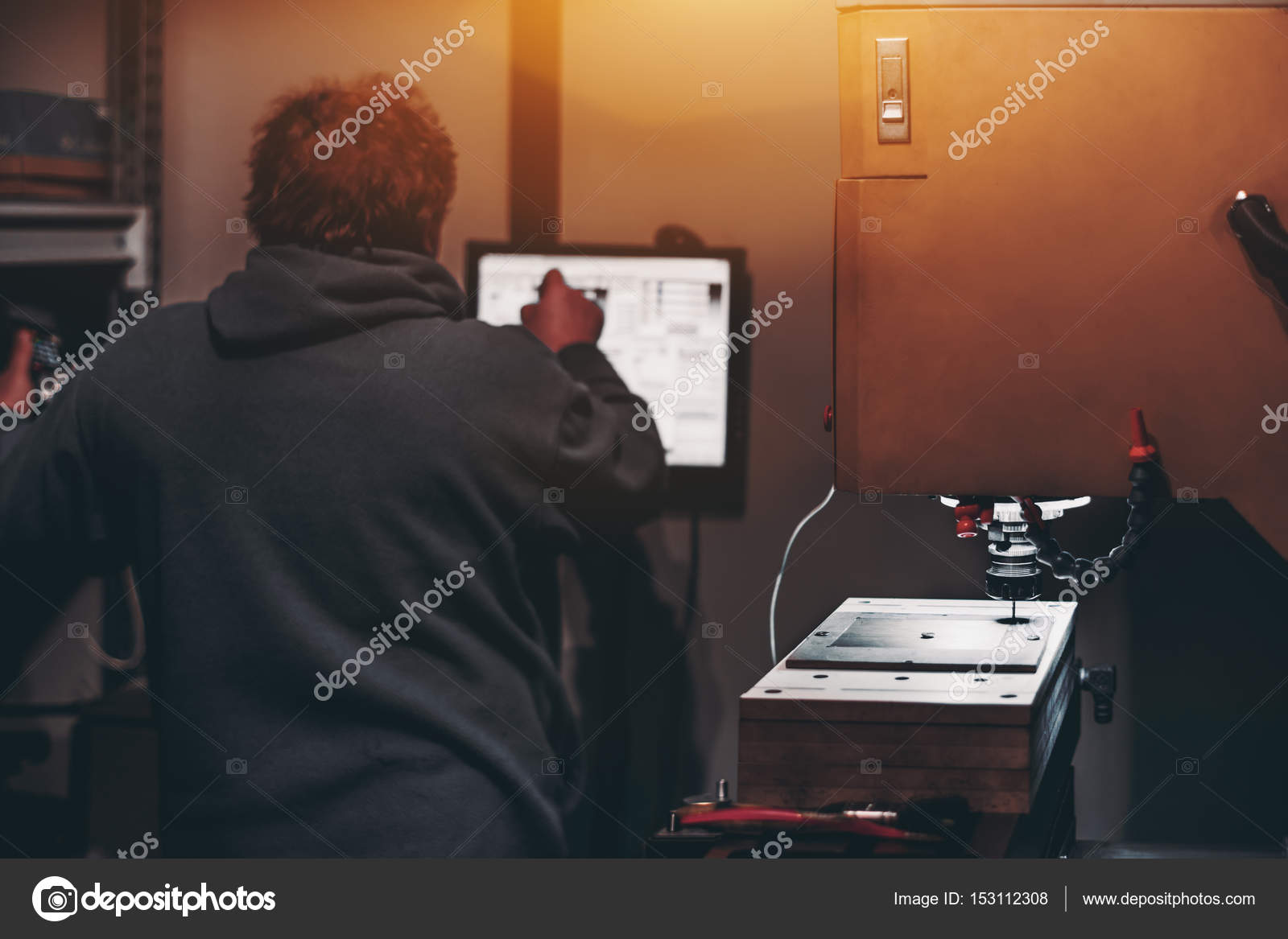 Worker with CNC milling machine Stock Photo by ©skynextphoto 153112308
