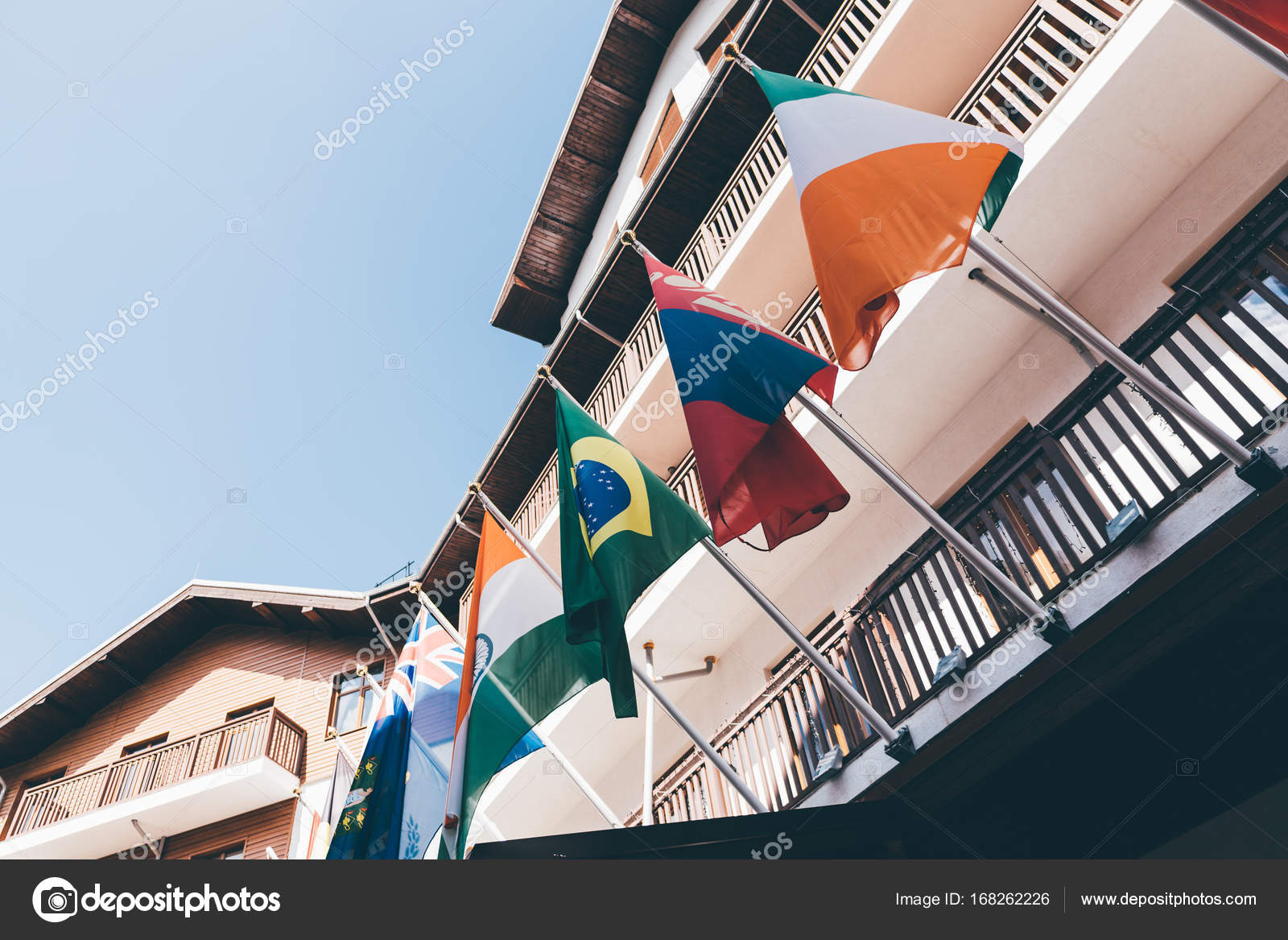 National flags fixed to facade of house Stock Photo by ©skynextphoto ...