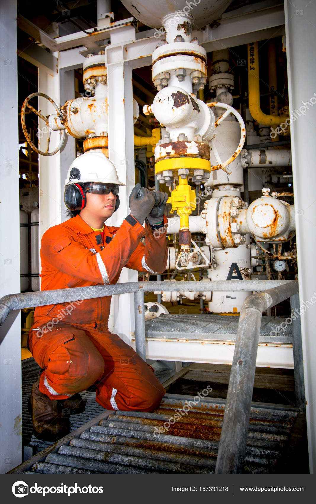 Techincian operator during close or open valve in process oil an Stock ...
