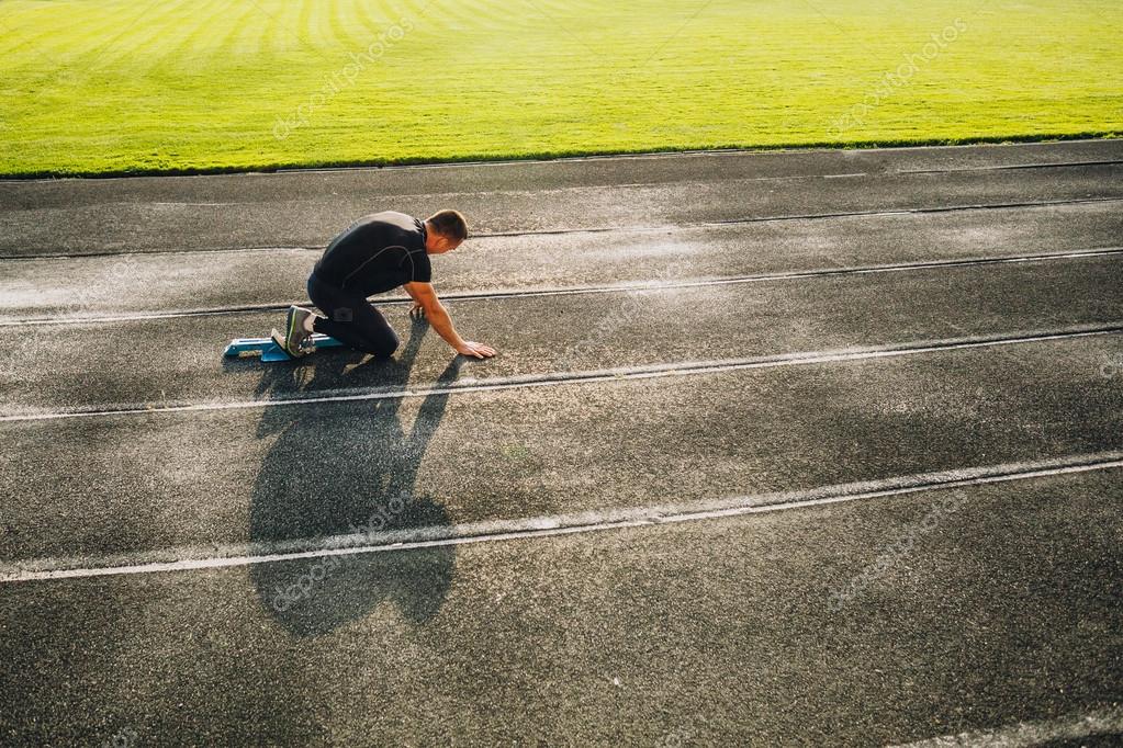 Athlete doing sports exercises Stock Photo by ©Amvorsuf 126881490