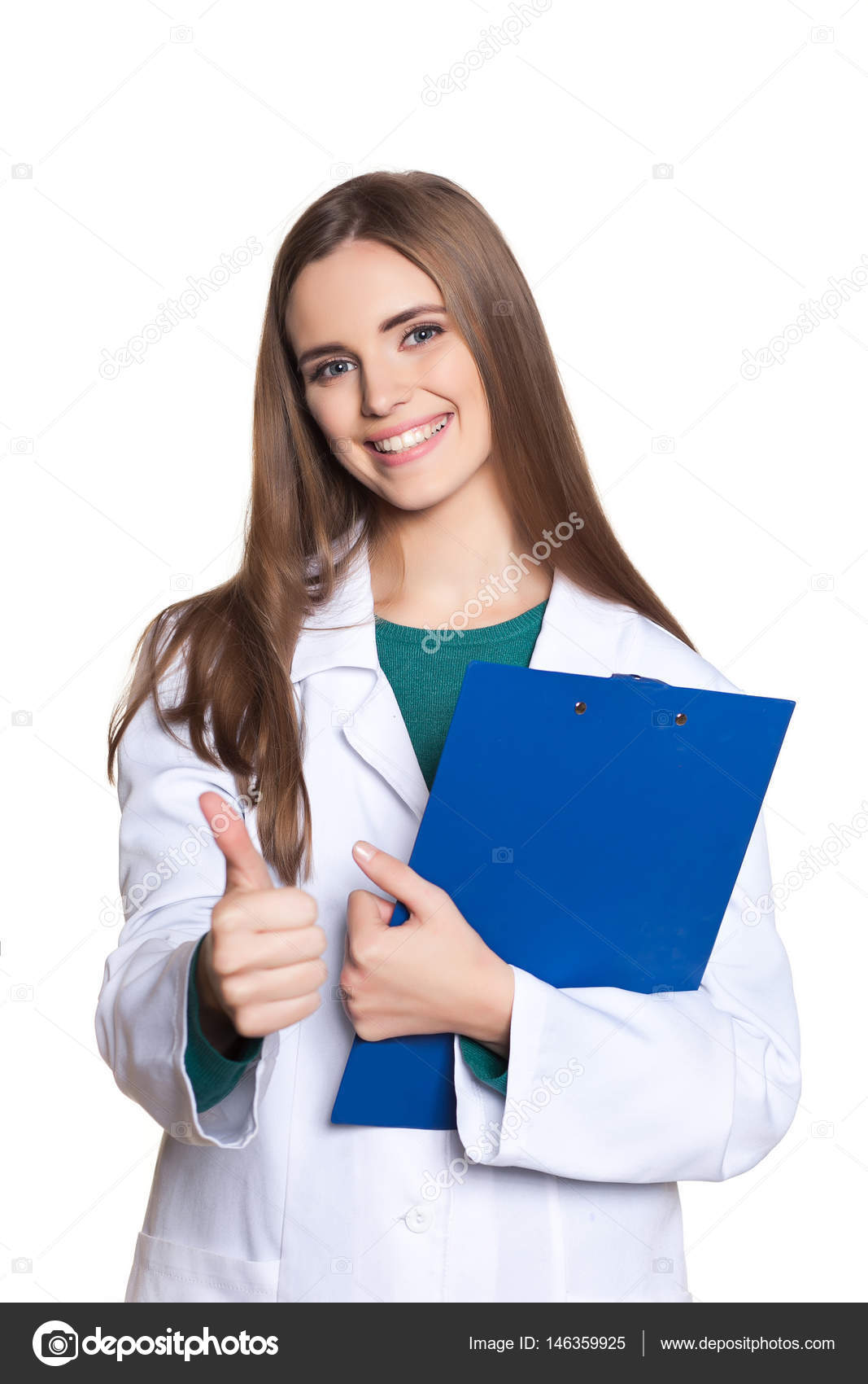 Young female student doctor with a tablet on a white background showing ...