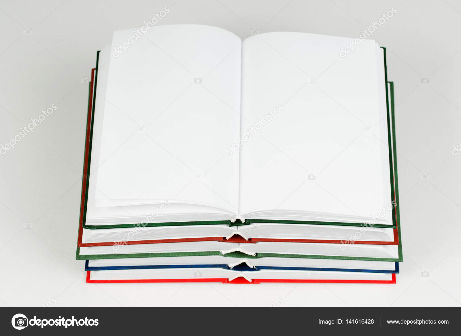 Open book, stack of hardback books on table. — Stock Photo © Nagornyi ...