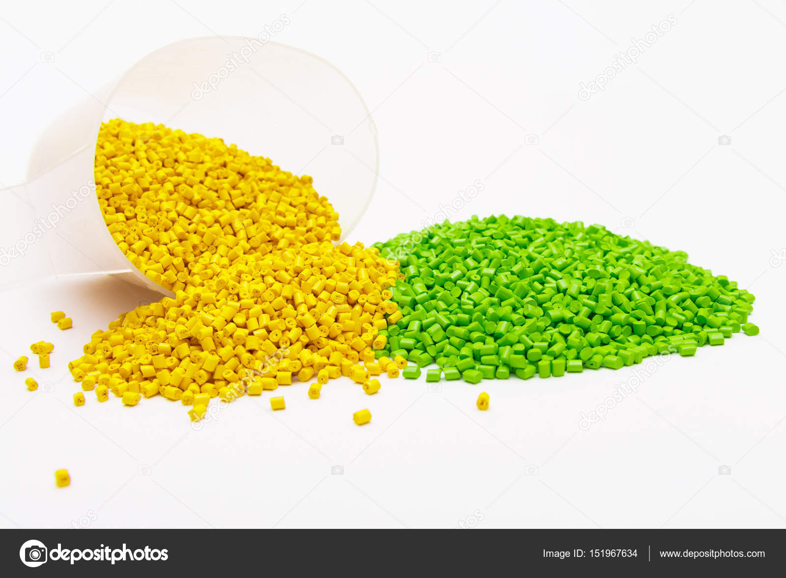 Green and yellow plastic pellets scattered from the measuring Cu ⬇ ...