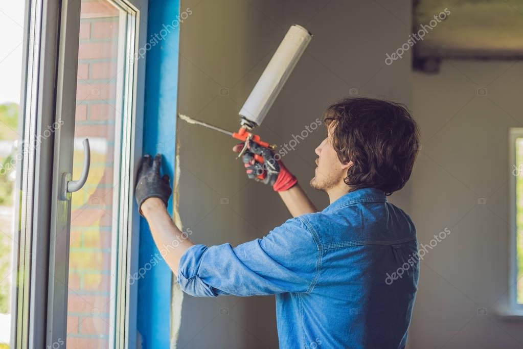 Man does window installation — Stock Photo © galitskaya #161140084