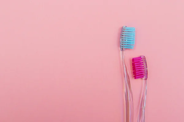 Pink and blue toothbrushes — Stock Photo © Katya_Havok #126477228