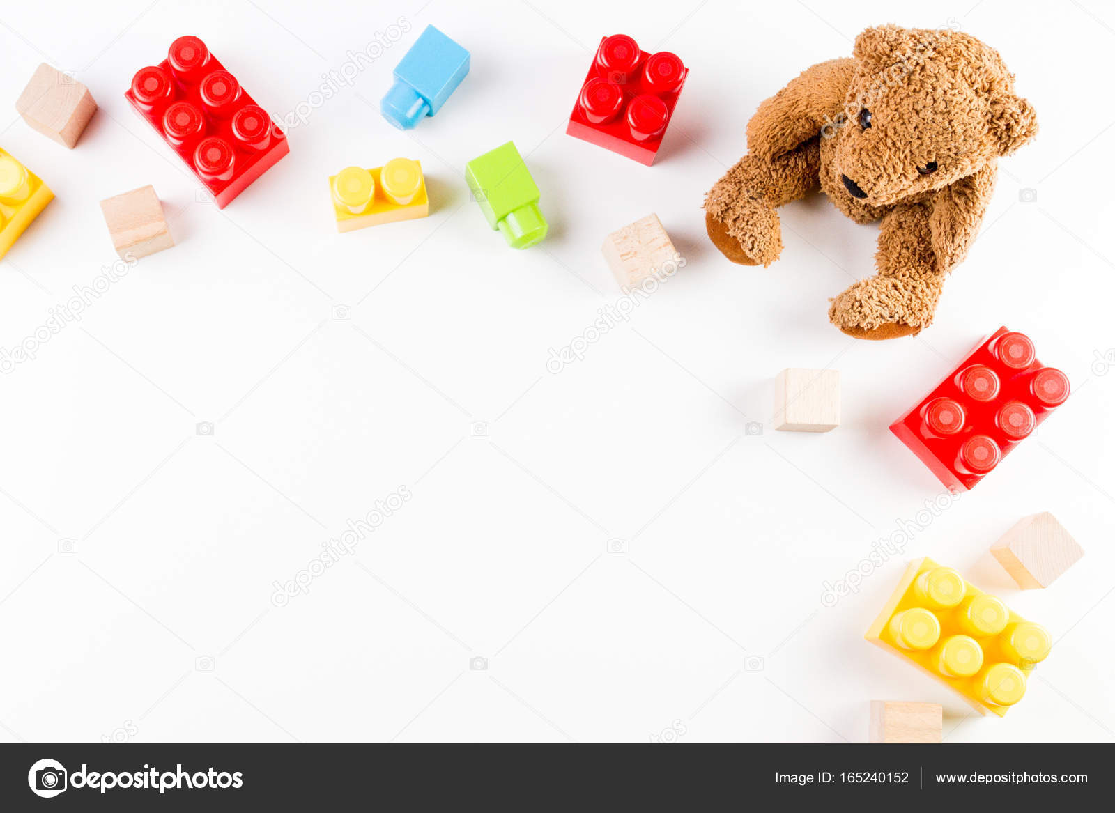 Kids toys background with teddy bear and colorful blocks Stock Photo by ...