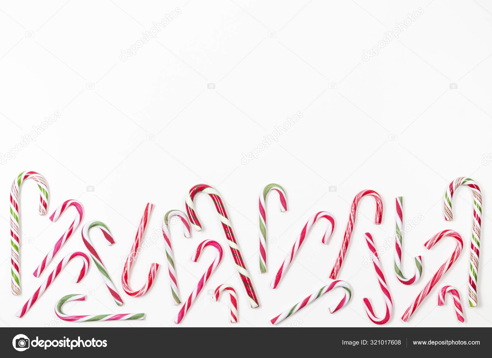 Candy canes border frame on white background. Top view, copy space ...
