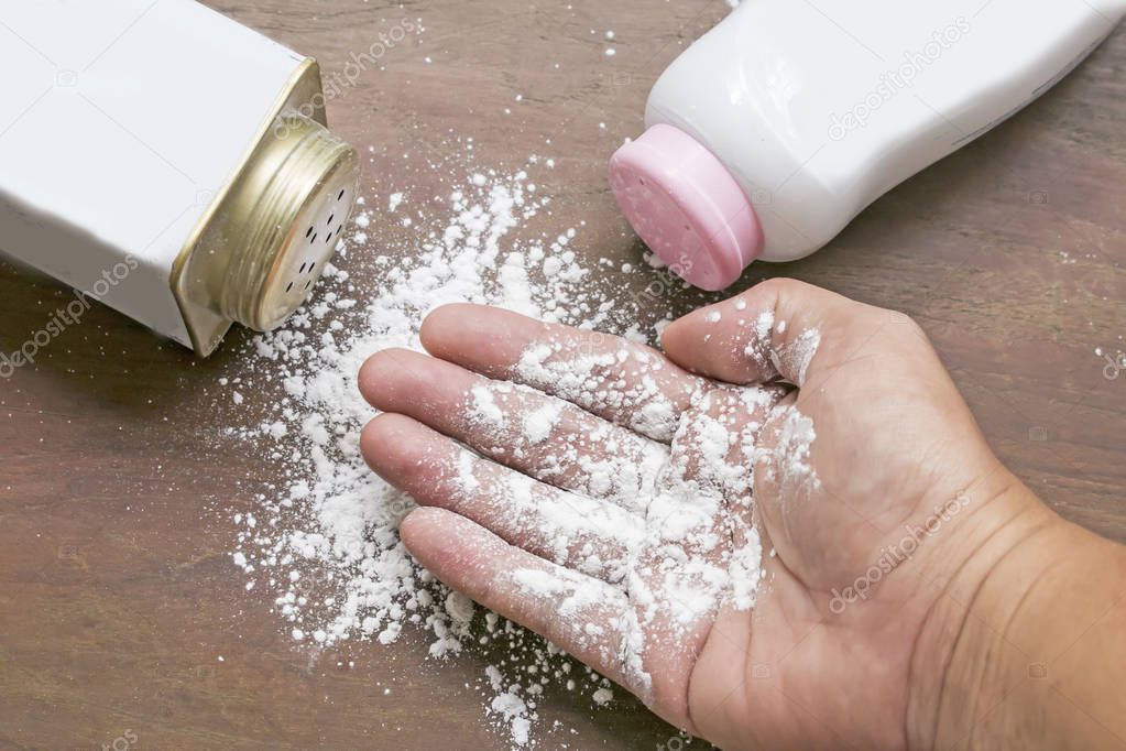 White talcum powder in hand Stock Photo by ©Gobba 129213726