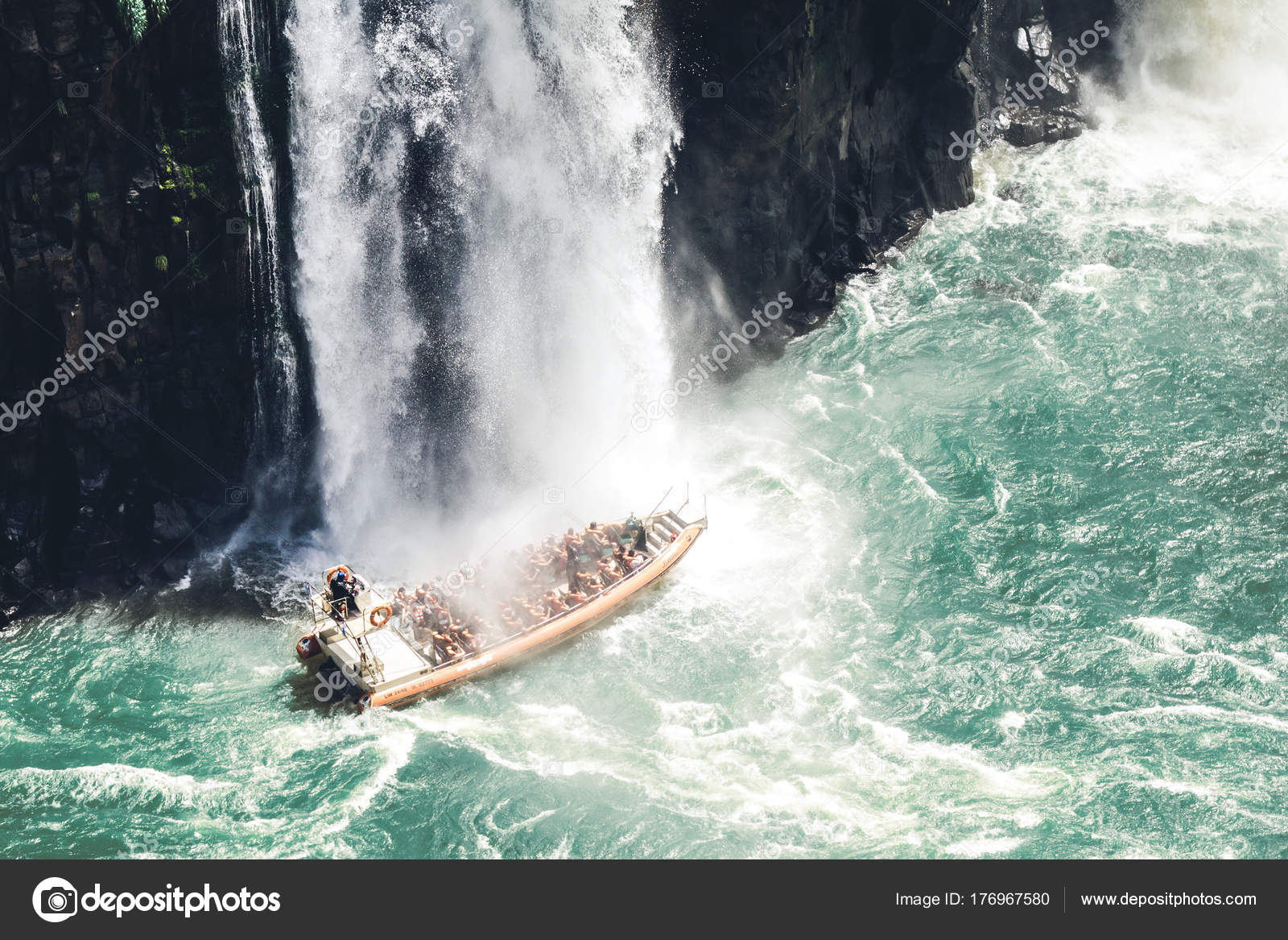 Boat under a waterfall Stock Photo by ©kbarzycki 176967580