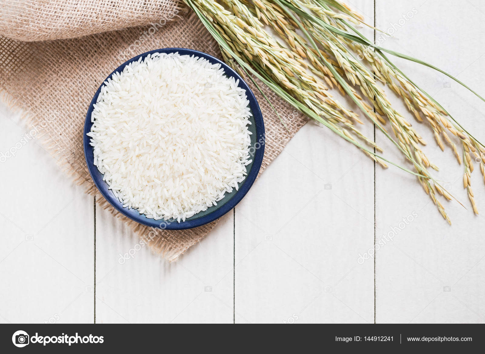 Jasmine rice in the blue plate Stock Photo by ©Sorrapongs 144912241
