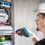 Professional Electrician Inspecting Wires Electrical Box Stock Photo by ...