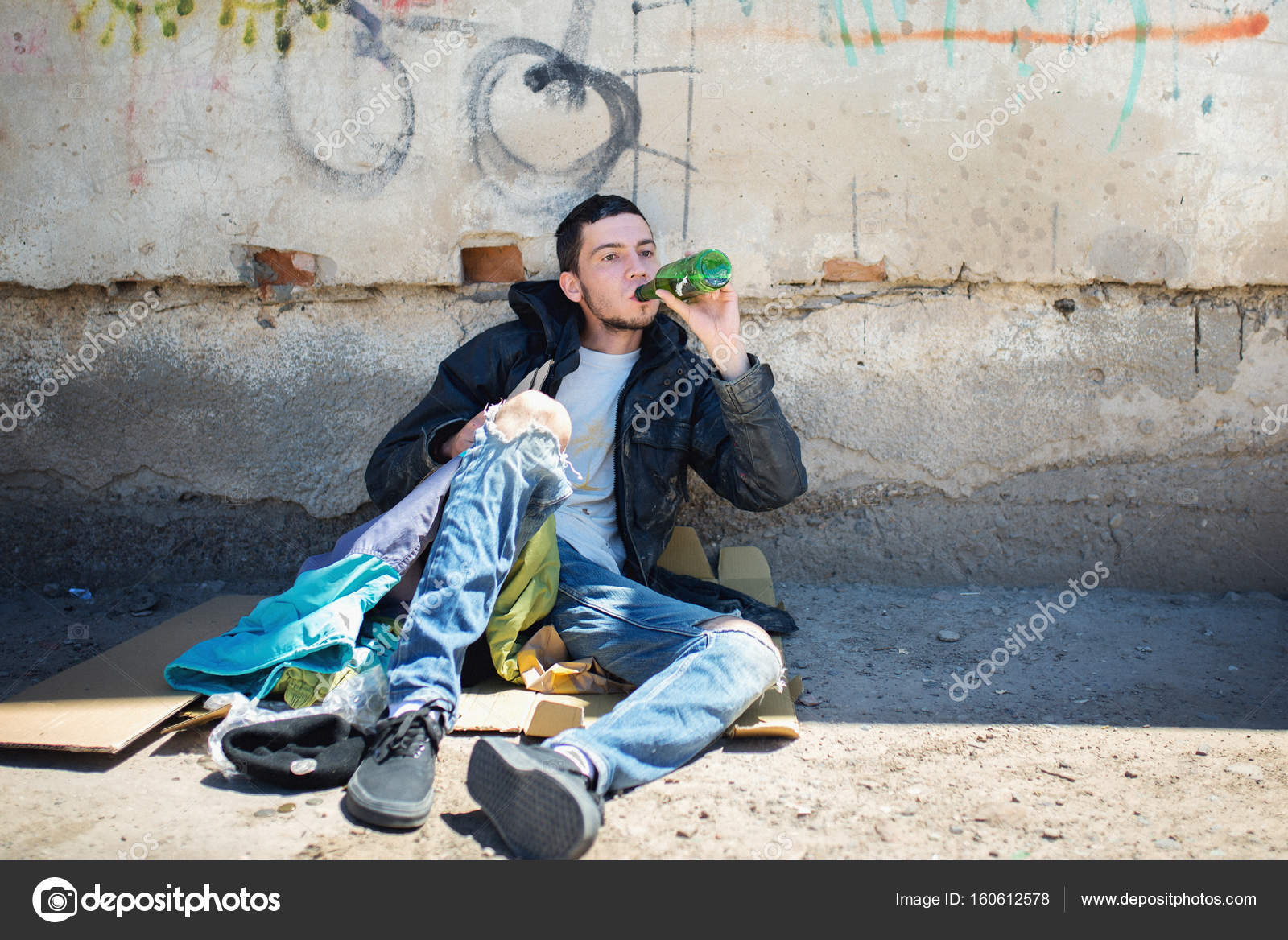 Homeless man drinking beer ⬇ Stock Photo, Image by © Kulichok #160612578