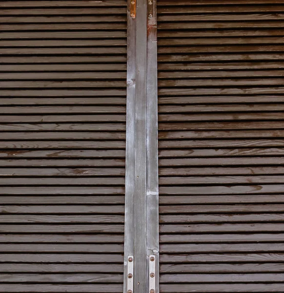 Rustic brown wooden window shutter - Stock Image - Everypixel