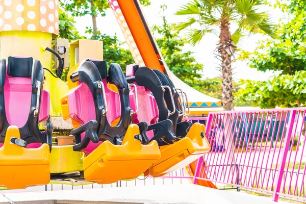 Colorful roller coaster seats at amusement park — Stock Photo © topntp ...