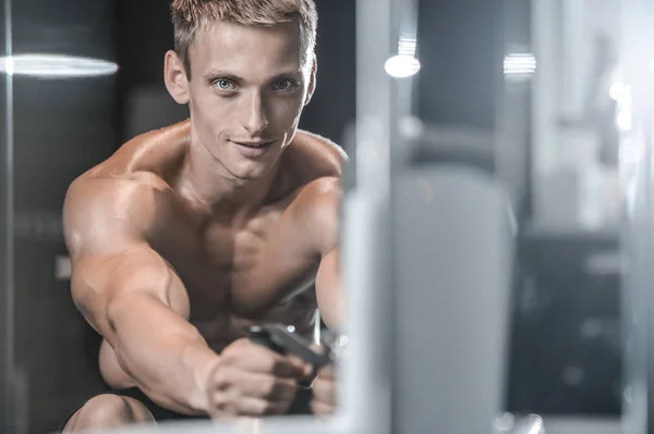 Handsome model young man training back in gym - Stock Image - Everypixel