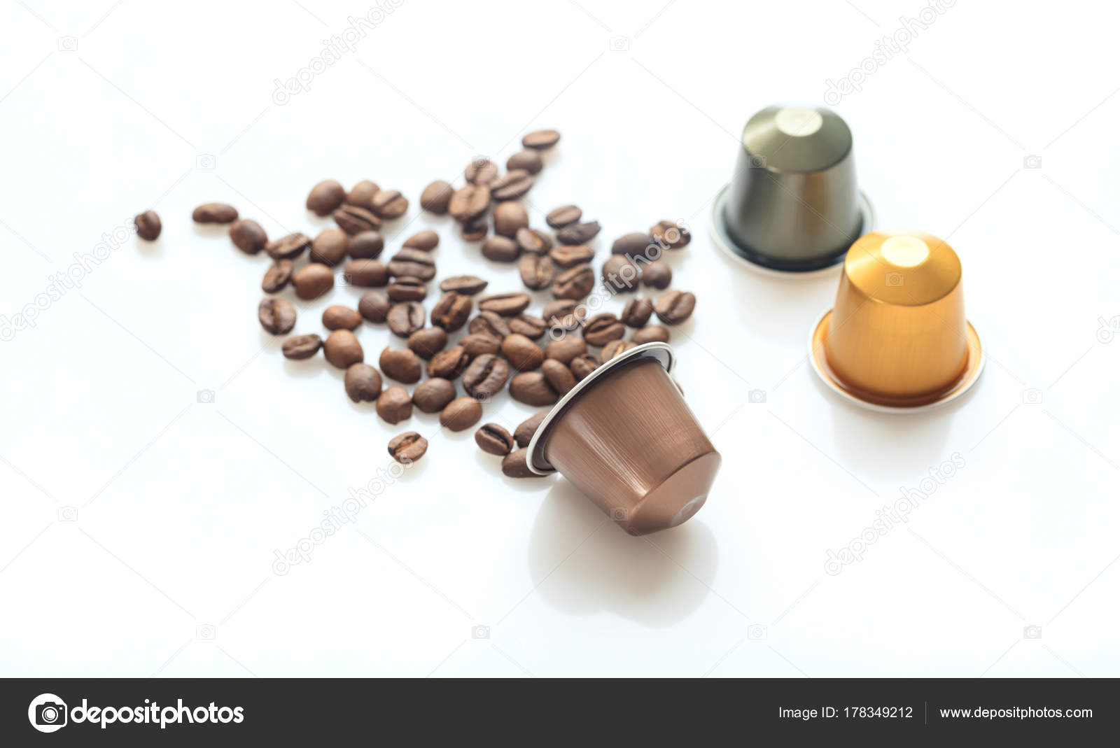 Espresso coffee pods and coffee beans on white background, Closeup view ...