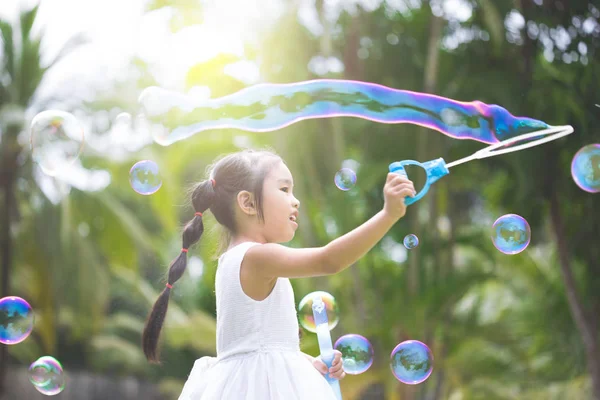 Kids playing bubble Stock Photos, Royalty Free Kids playing bubble ...