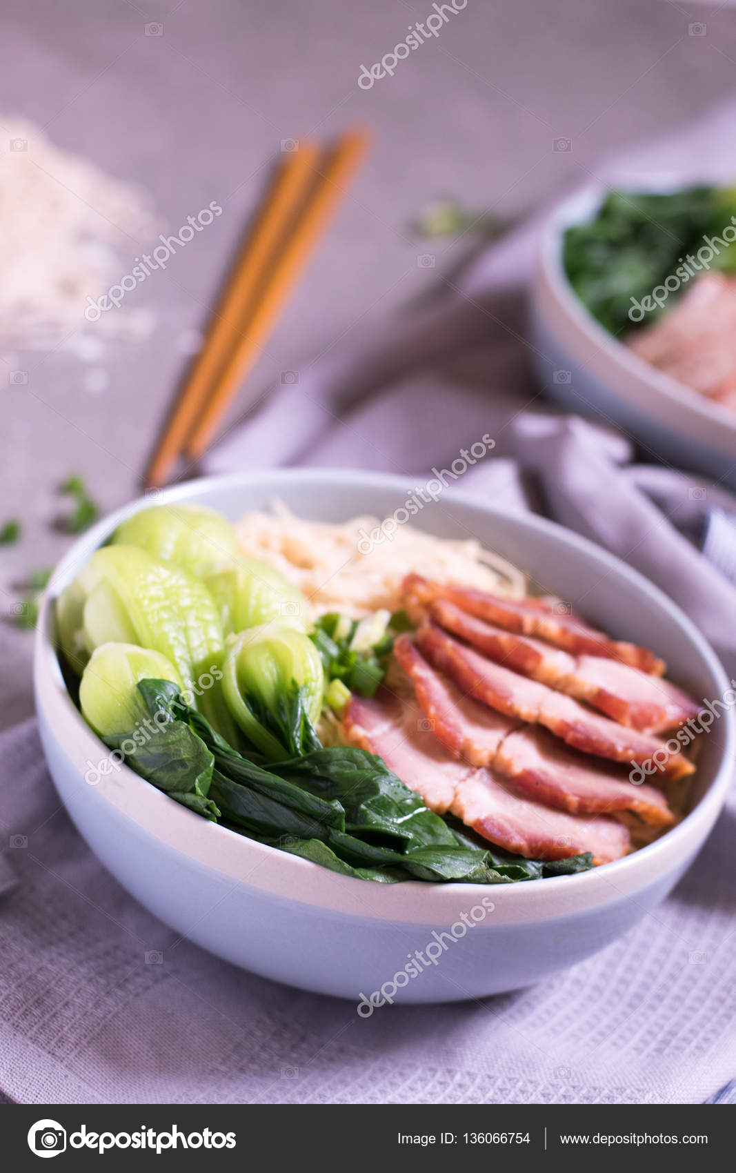 Instant noodles with shiitake mushrooms, pepper and onion in a b Stock ...