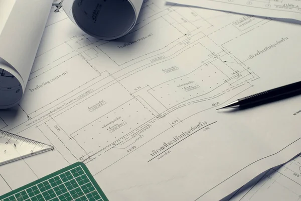 architectural plans project drawing with blueprints rolls - Stock Image ...