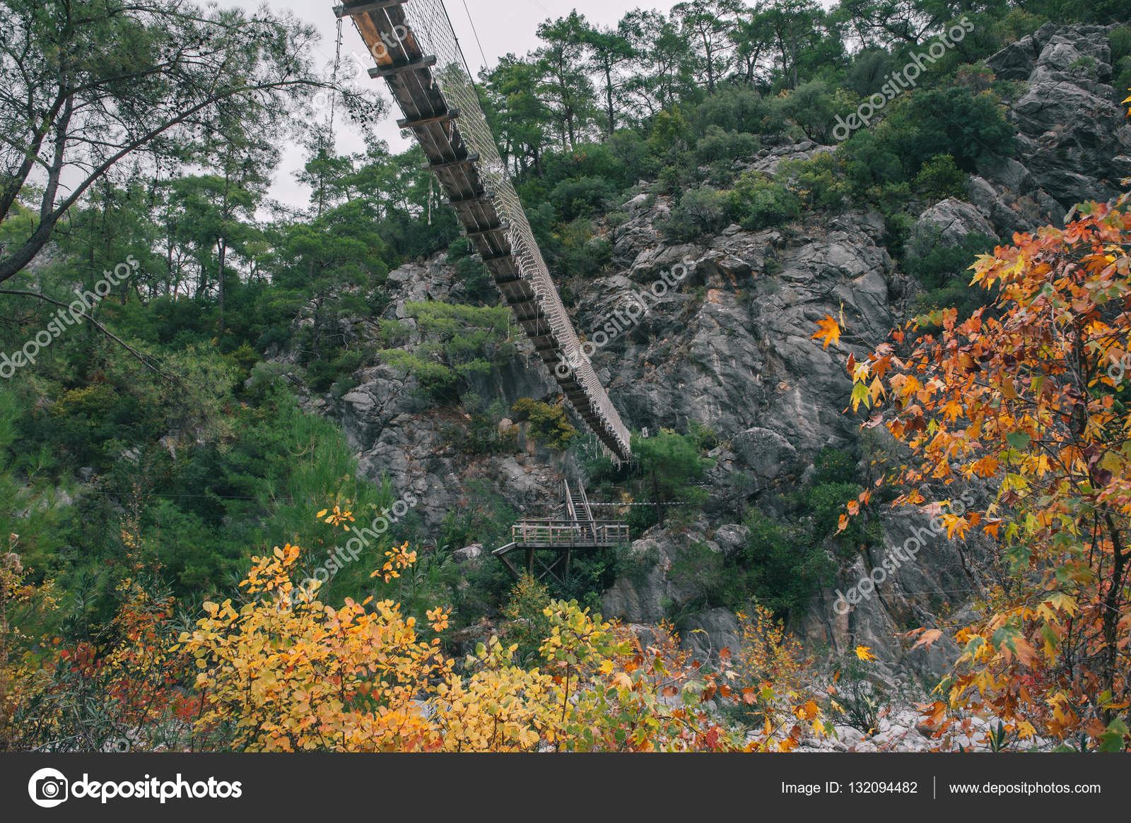 Suspension Bridge between Rock Stock Photo by ©dmytrobandak 132094482