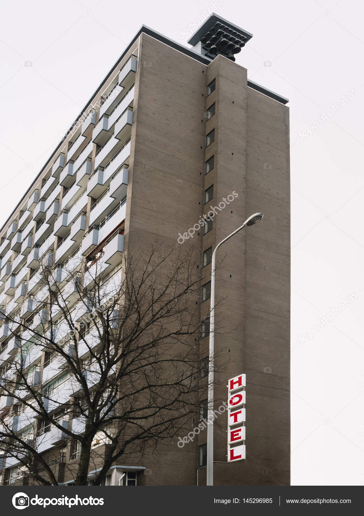Vertical building that is a hotel — Stock Photo © karrastock.gmail.com ...