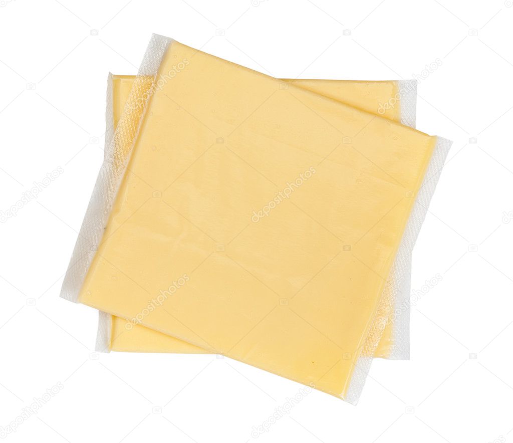 Two yellow cheese slices packaged on white background. Close-up, Stock ...