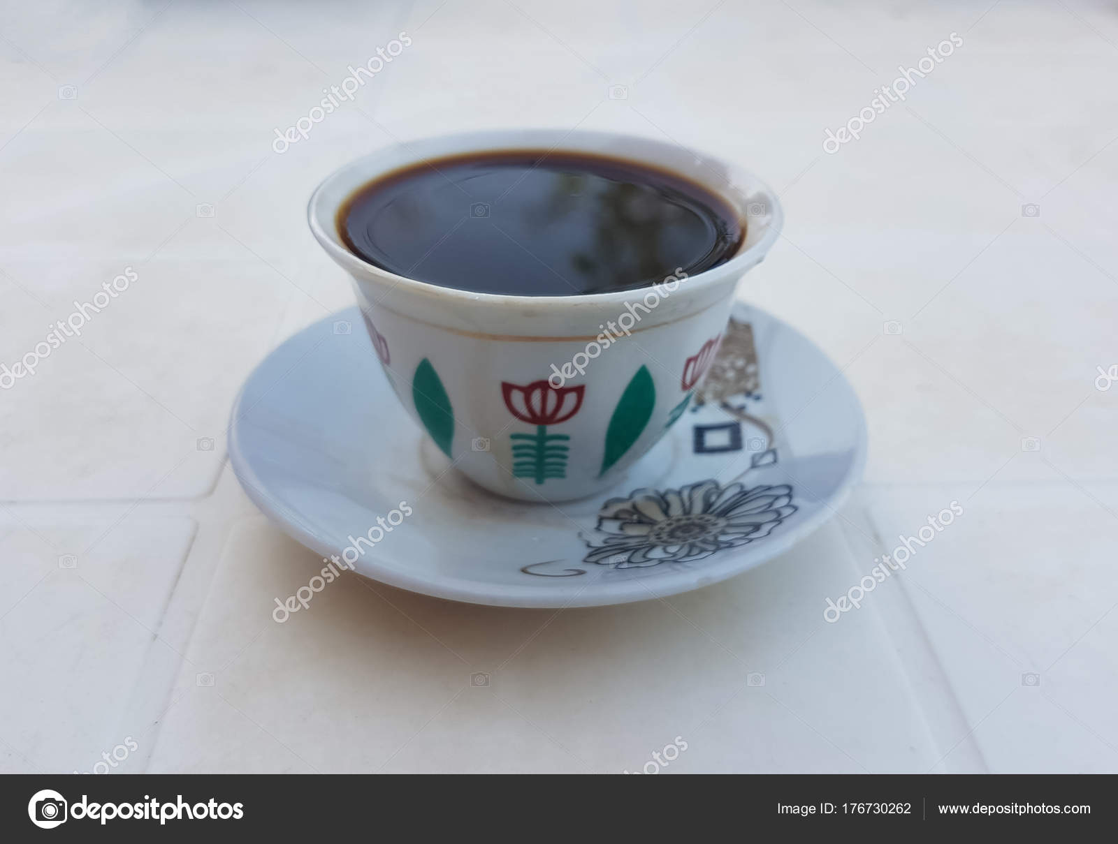 Ethiopian coffee in a cup from a street coffee seller — Stock Photo ...
