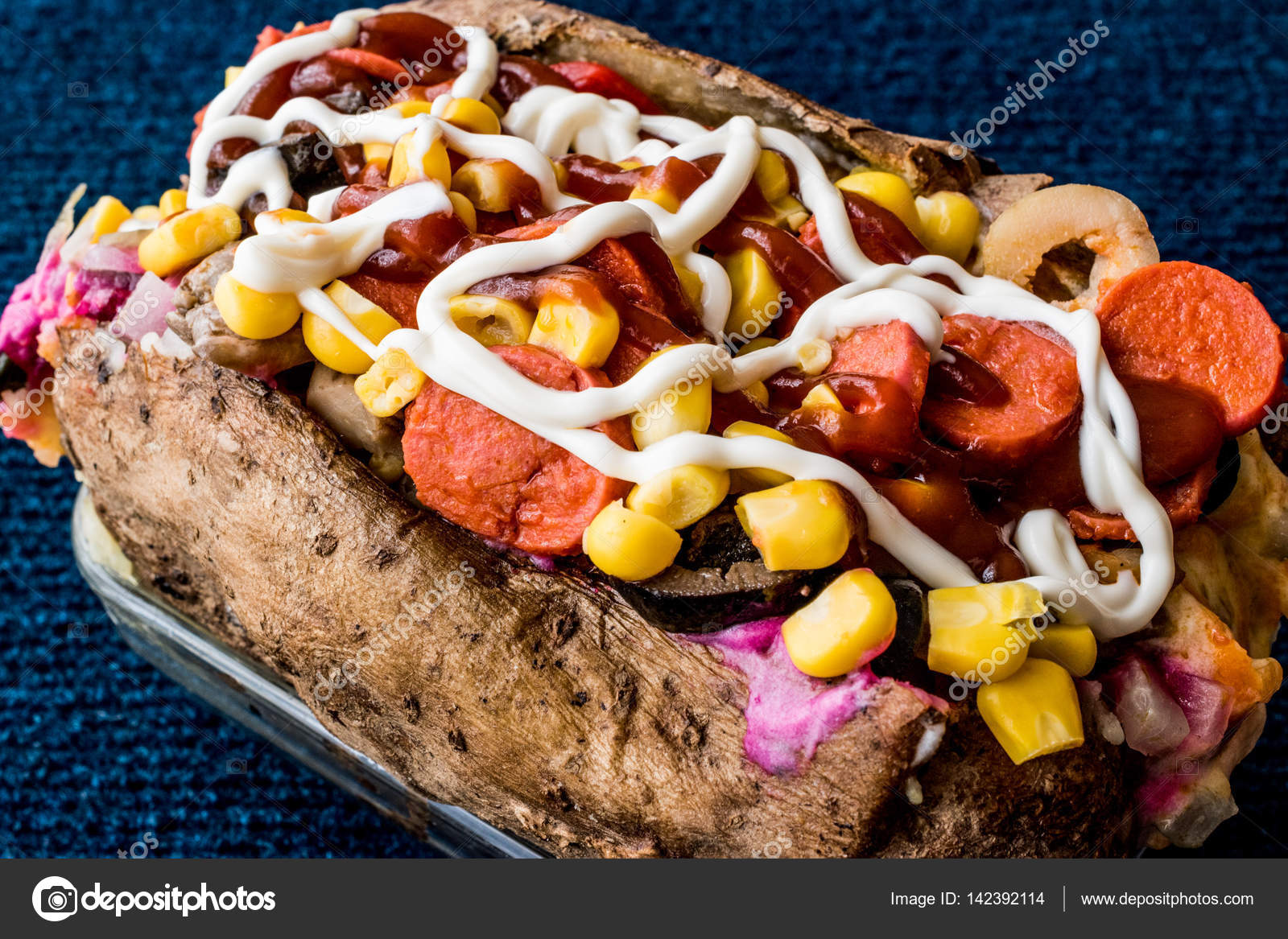 Kumpir / Turkish Baked potato with cheese, corn, sausage, ketchup and ...