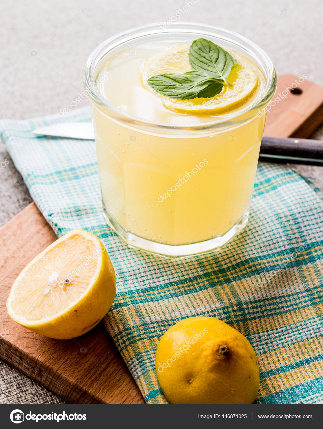 Lemonade drink of soda water with mint leaves and lemon. Stock Photo by ...