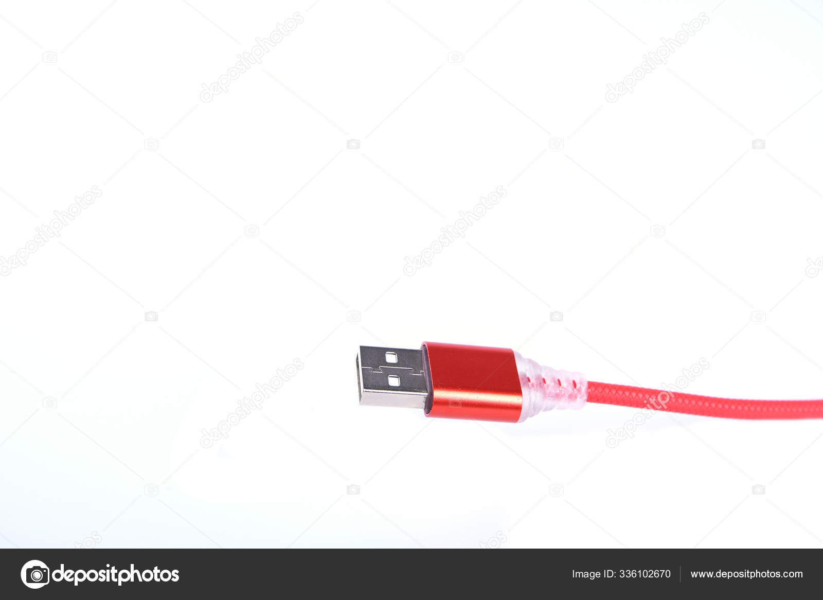 Red USB cable for smartphone charge isolated on white background ...