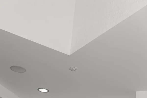 Modern layered ceiling with embedded lights and stretched ceiling inlay ...