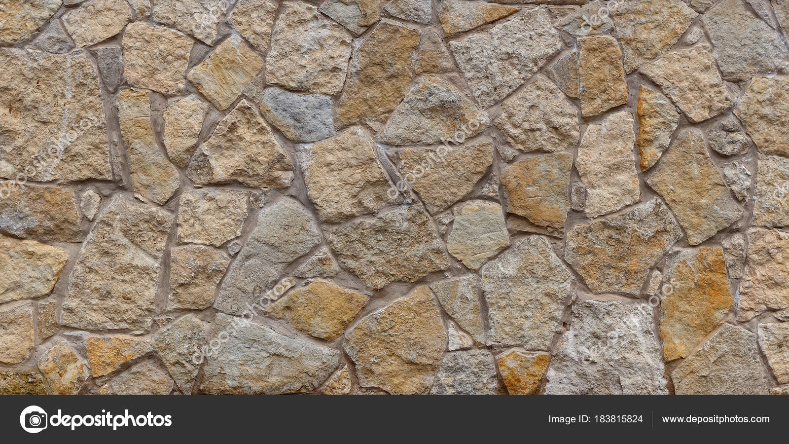 Stones of different size in the wall texture background of natural ...