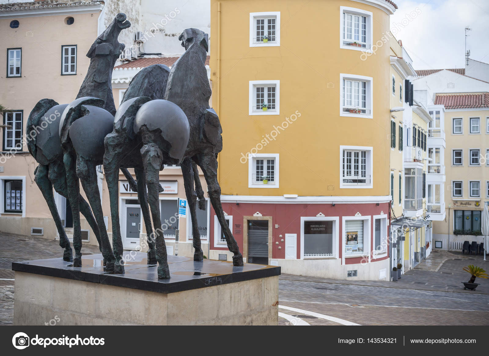 MAO-MAHON,Street view, colored buildings and sculpture Tre Cavalli ...