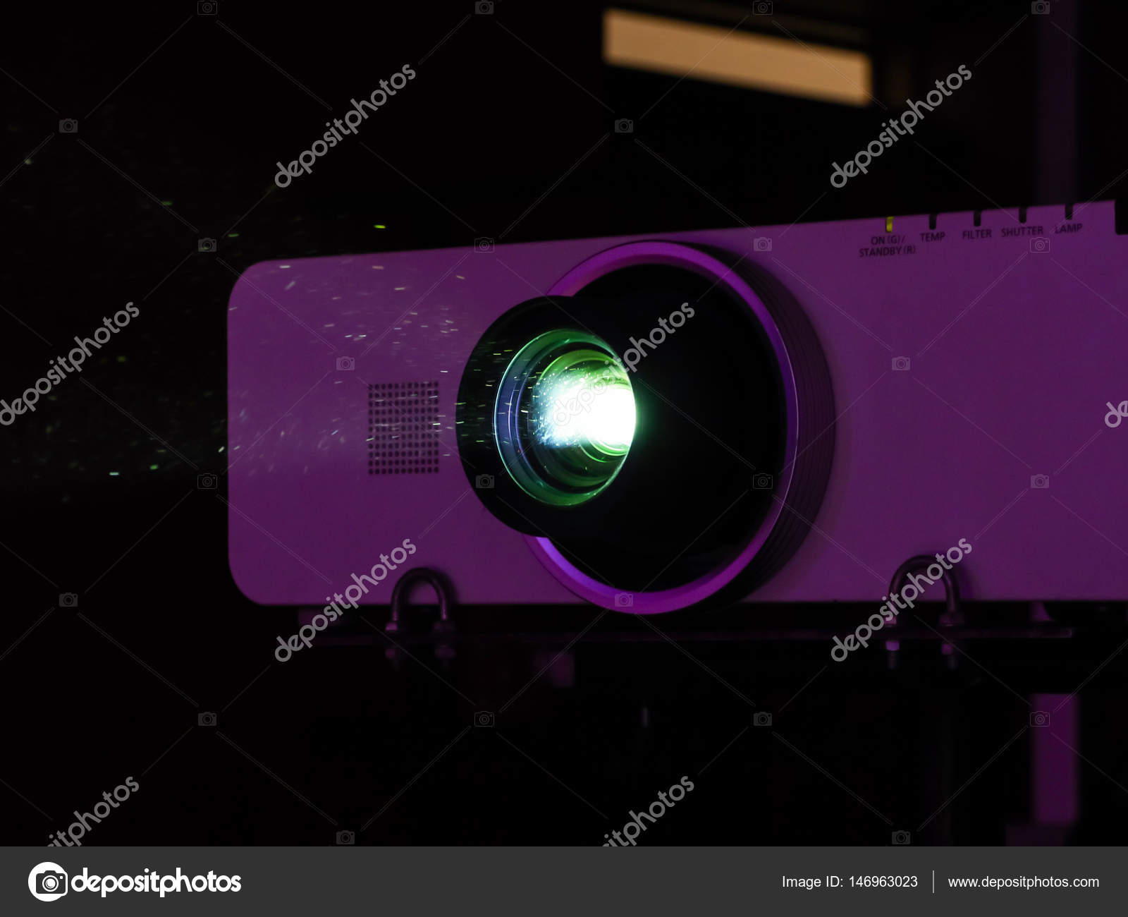 The video projector. The beam of light from the lens, dust in the air ...