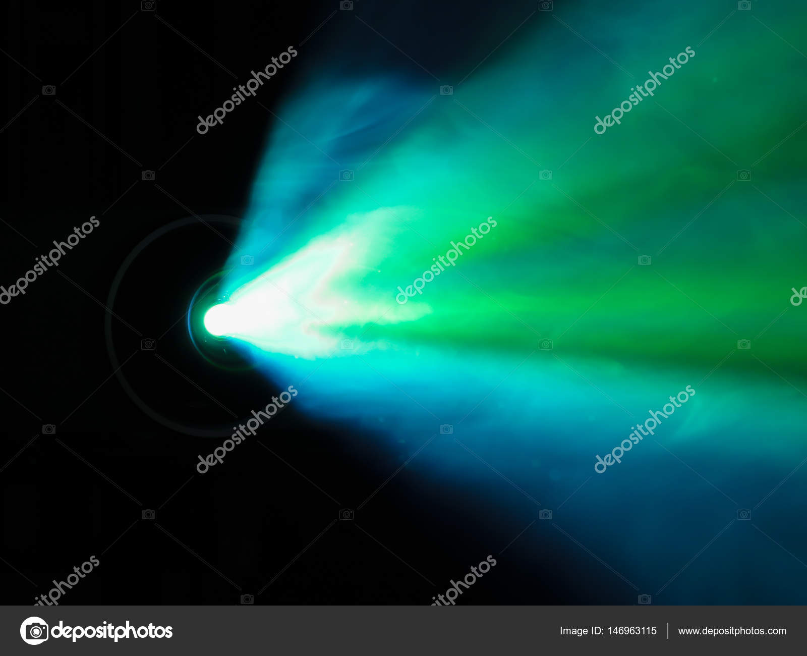 Blue-green rays of light through the smoke from the projector. Lighting ...