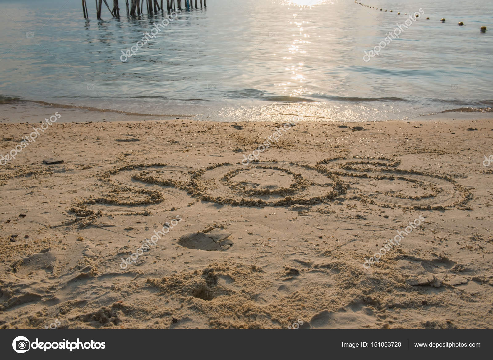 Word SOS Write in sand on the beach — Stock Photo © oatautta@gmail.com ...