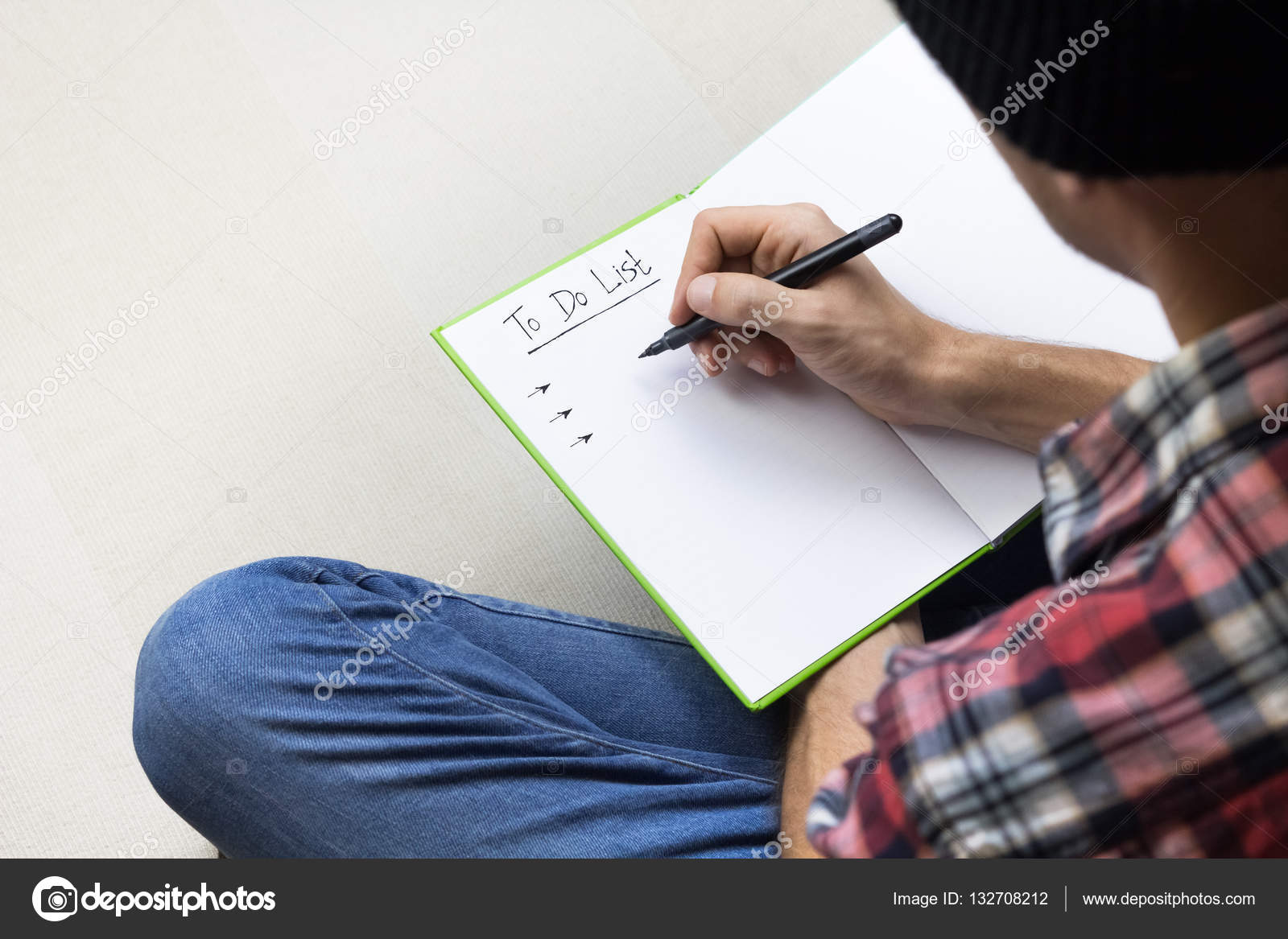 Person making to do list Stock Photo by ©Photoboyko 132708212