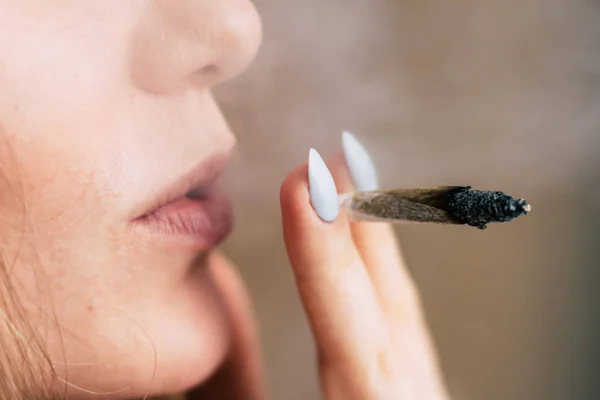 Woman smoking marijuana Stock Photos, Royalty Free Woman smoking marijuana Images | Depositphotos