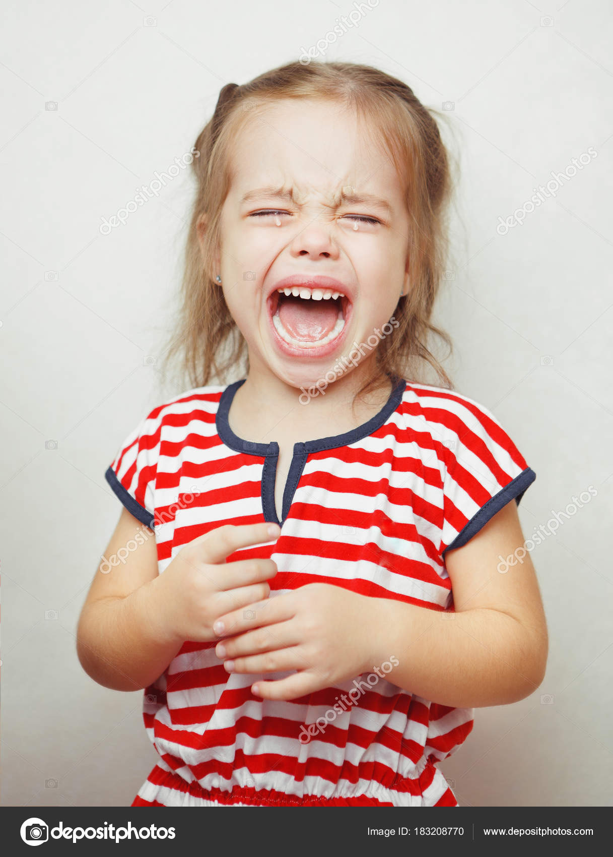 Child with tears falling down girls young face. loud cry of baby. Stock ...