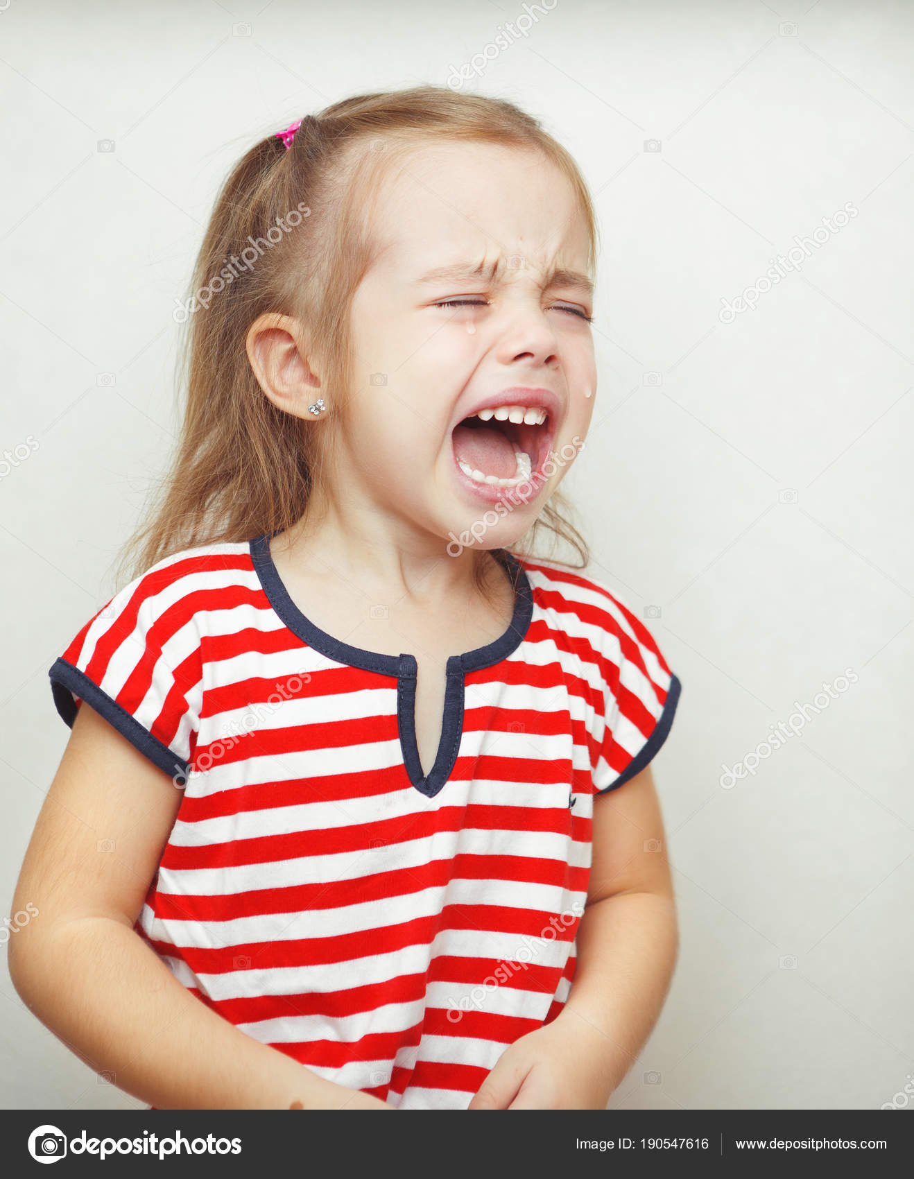 Child with tears falling down girls young face. loud cry of baby. Stock ...