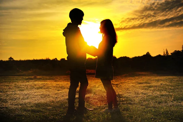 Shadow image of couples holding hands with the morning light wit Stock ...