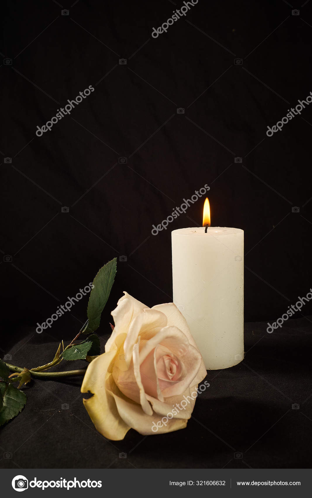 Burning candle and a beautiful rose on a black background Stock Photo ...