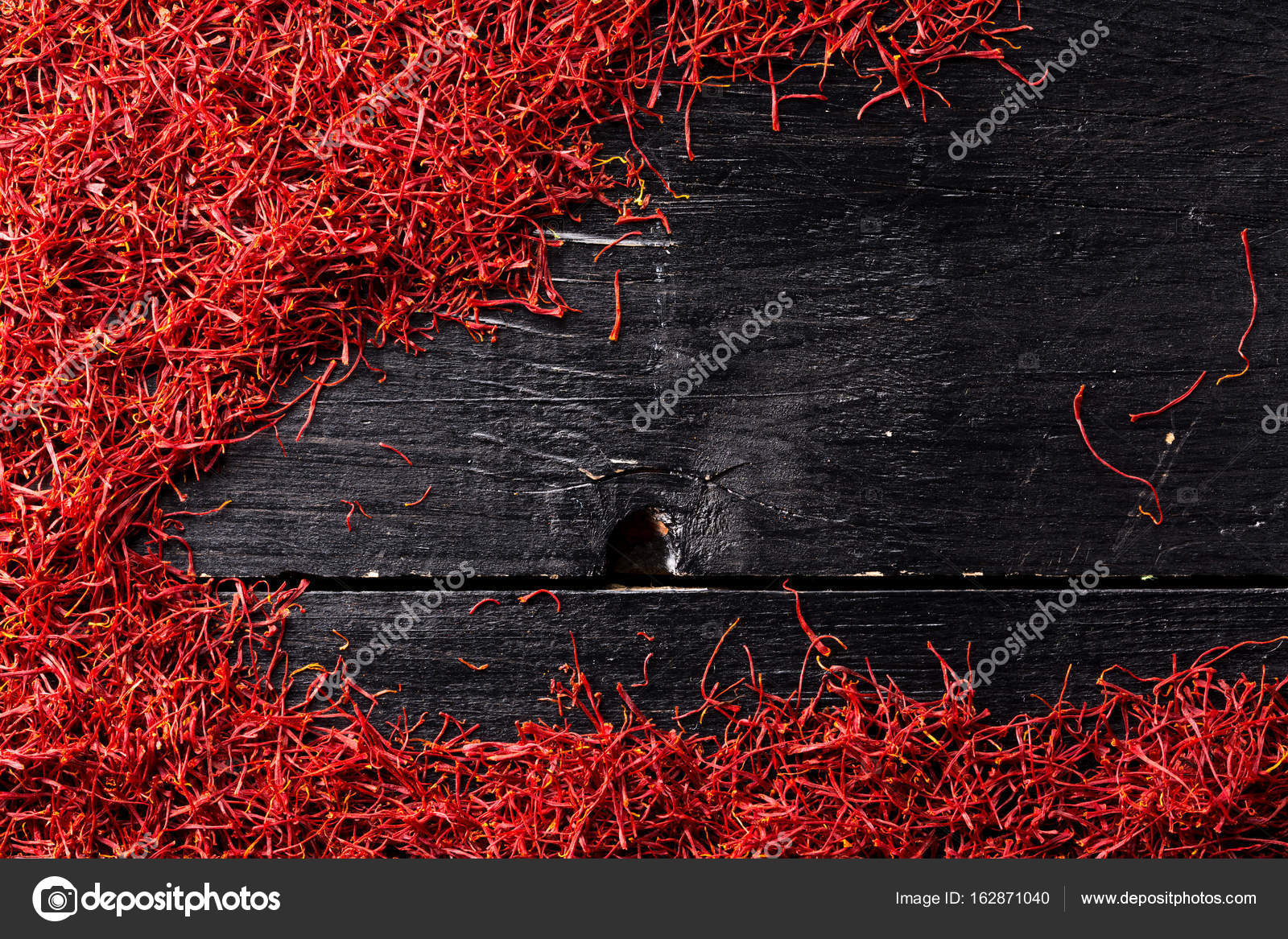 Saffron crocus threads on black wooden background ⬇ Stock Photo, Image ...