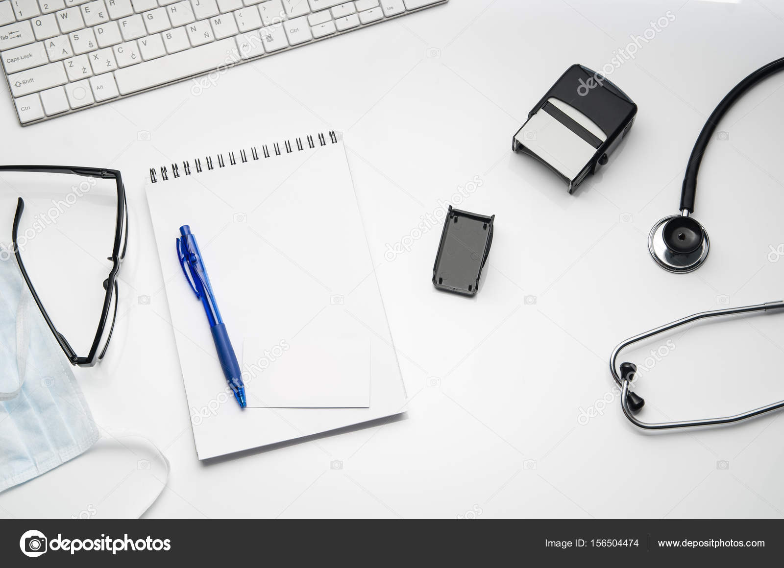 Doctors desk with medical accessories and products. Top view photograph ...