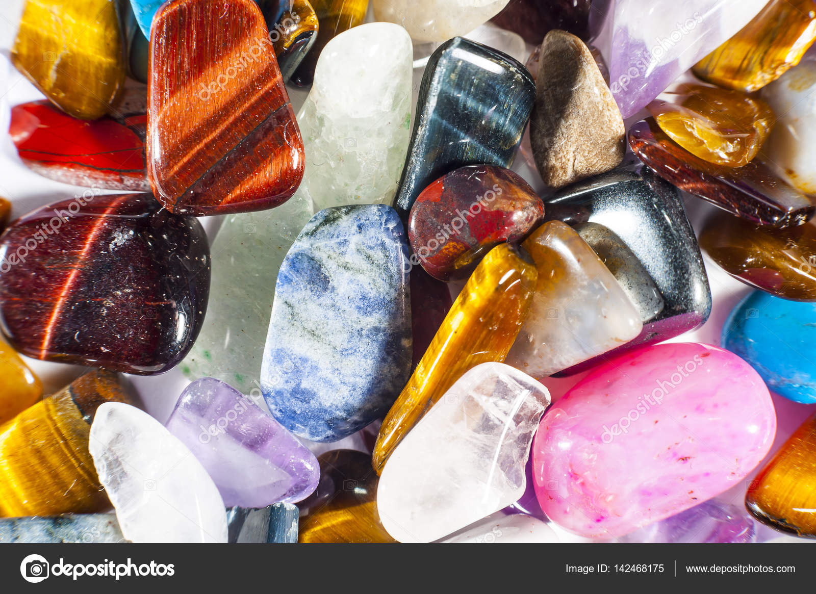 Full frame of rounded gemstones Stock Photo by ©Gleti 142468175