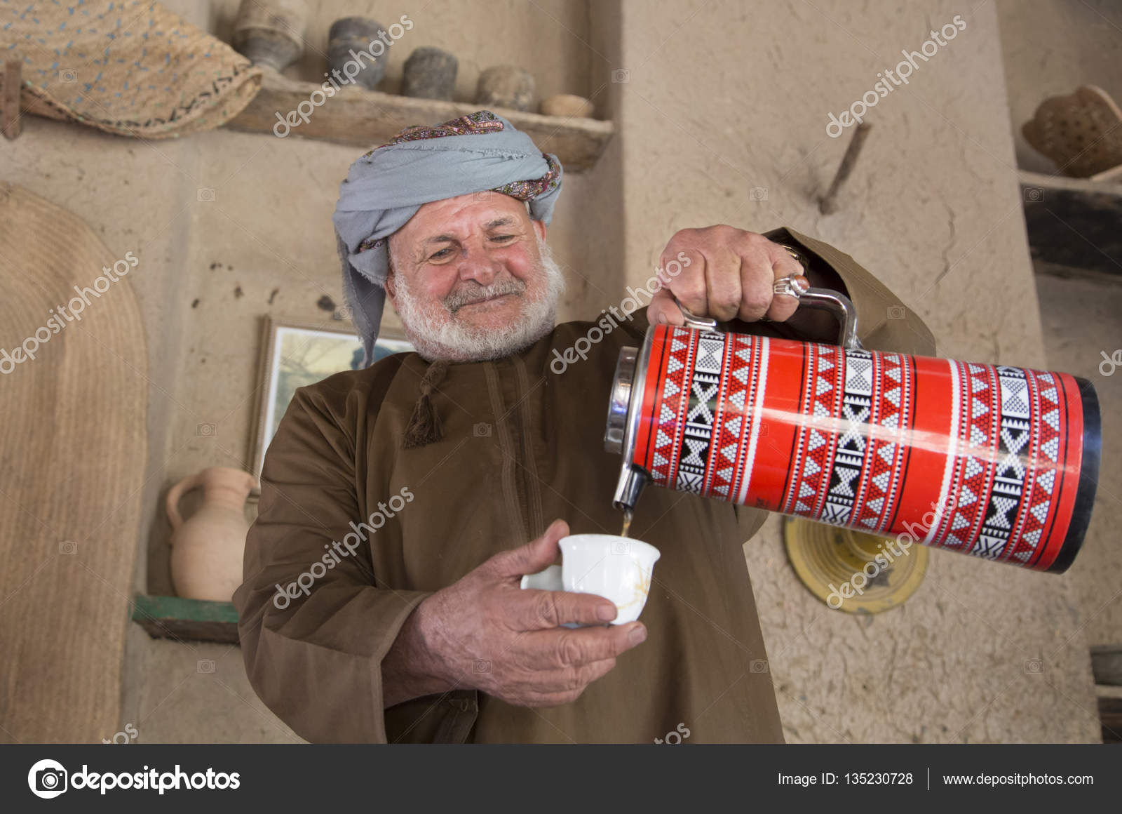 Omani man serving arabic coffee — Stock Editorial Photo © katiekk ...
